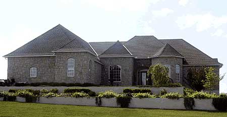 Plan 41034DB: Brick and Stone European-style Home Plan with Turreted Roof