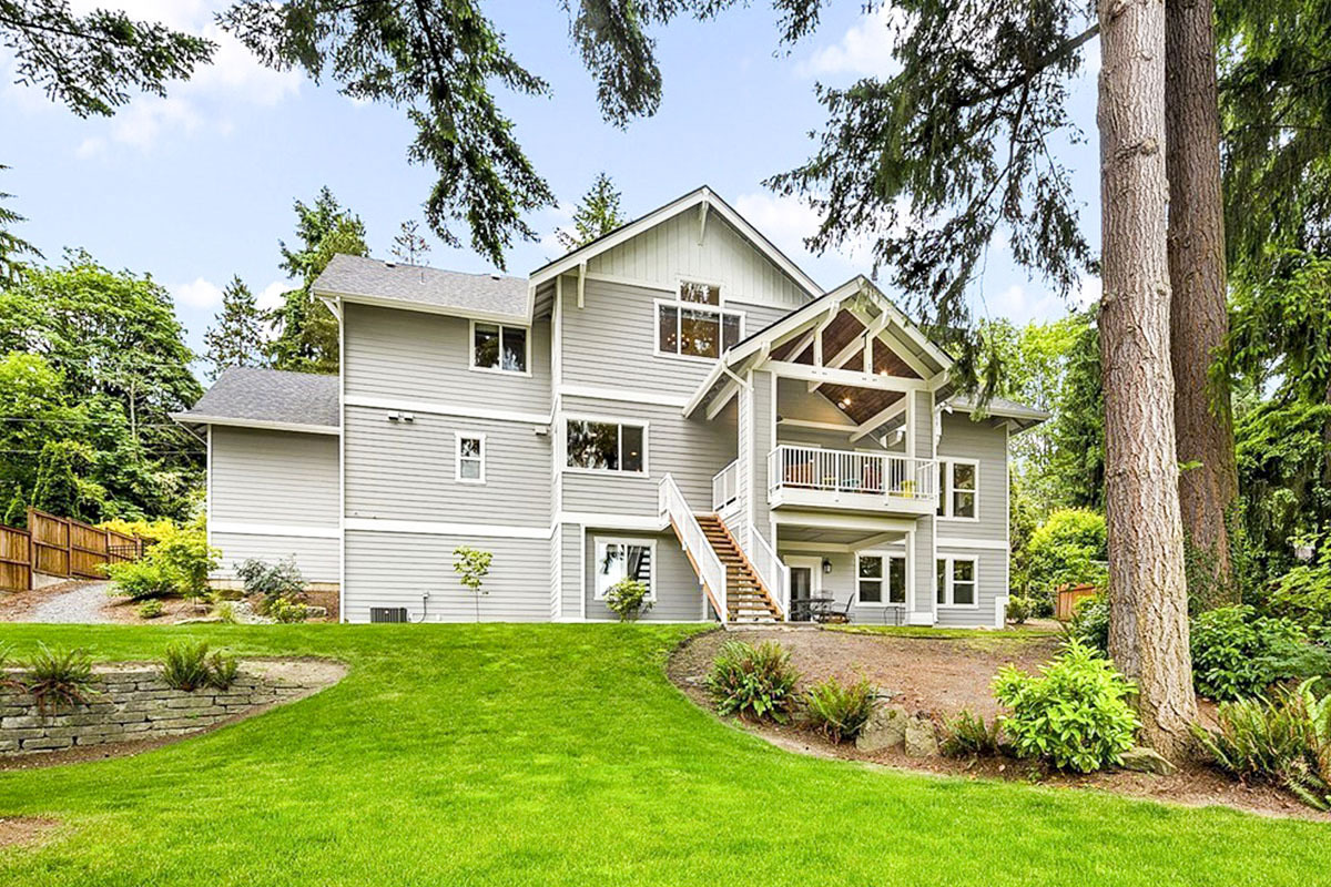 Spacious Multi-Gabled Two-story House Plan with Second-floor Master ...