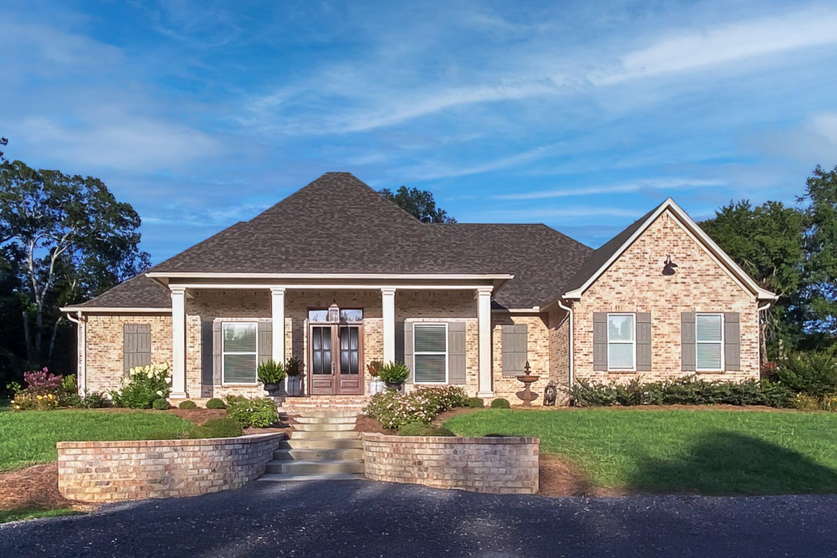 Plan 83955JW: Brick-clad Traditional Home Plan with Bonus Level