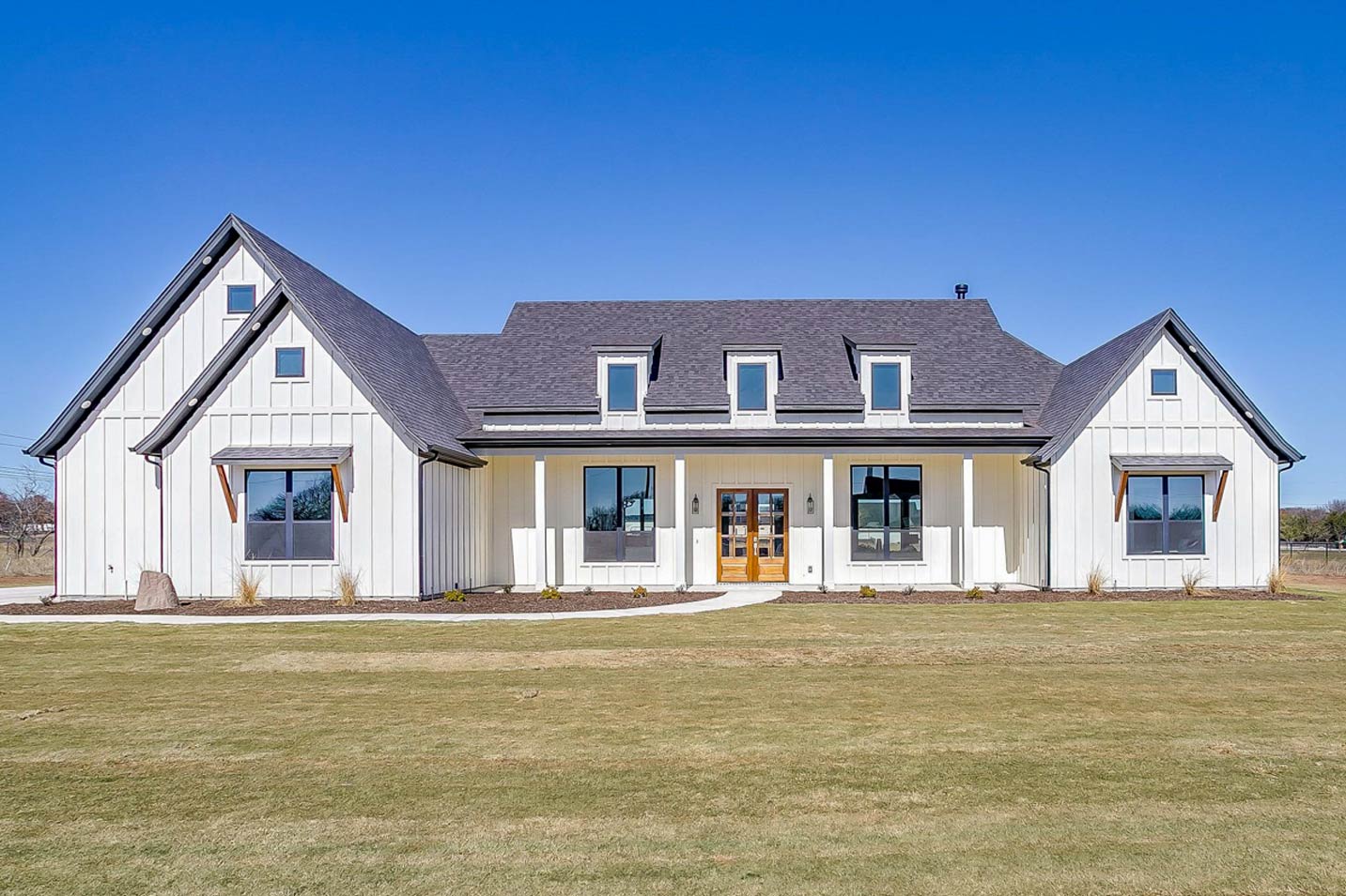 Plan 56568SM: Modern Farmhouse Plan with 4 Bedrooms and Outdoor Kitchen