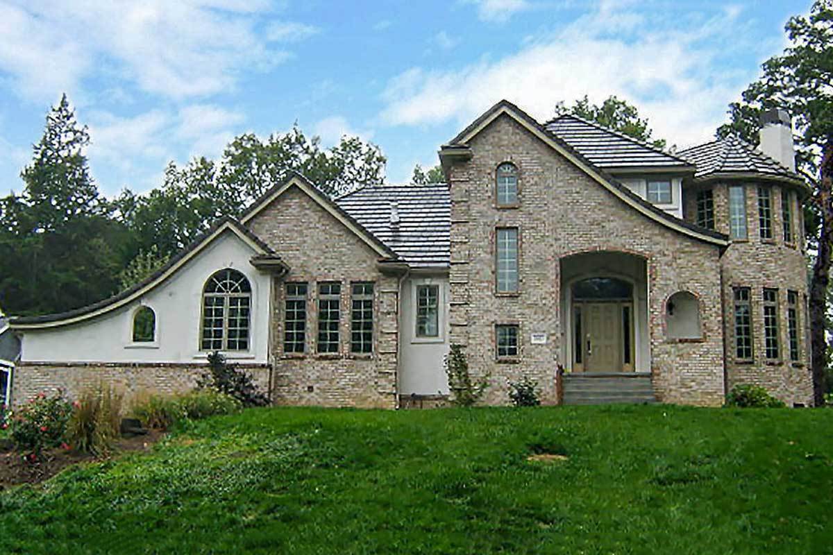 4-Bed House Plan with Graceful, Sweeping Rooflines - 62463DJ ...